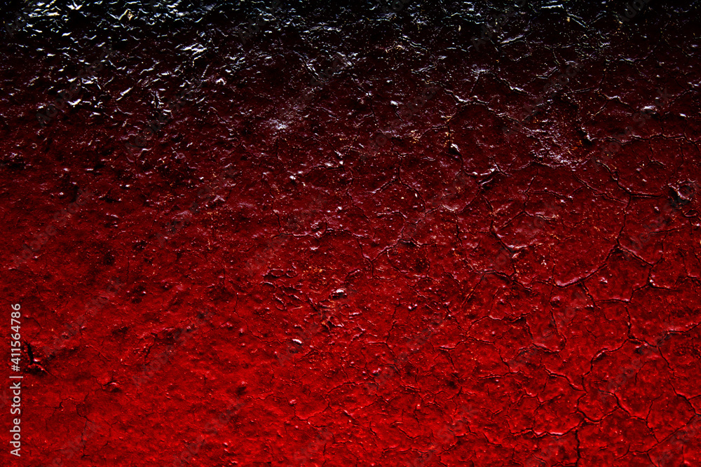 Abstract red background with gradient and darkening. A disturbing and ...