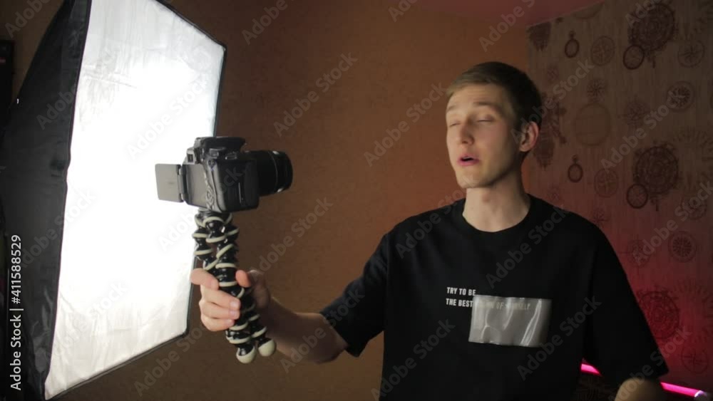 Famous young influencer excited while talking with the camera ...