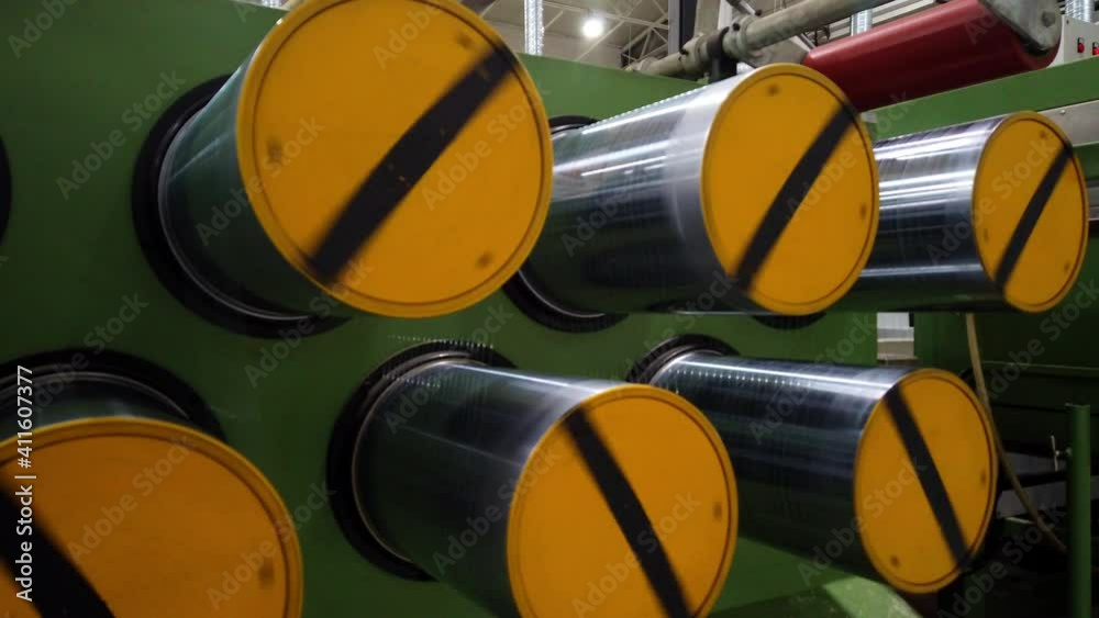 Industrial Rolling Machine. Wheel stretching filament after the ...