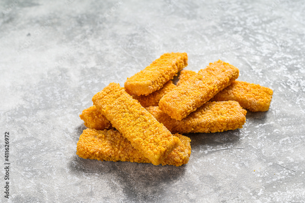 Frozen fish sticks. Organic fish food. Gray background. Top view Stock ...