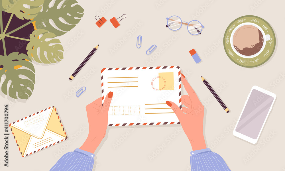 Female hand holding an envelope. Correspondence and mail delivery ...