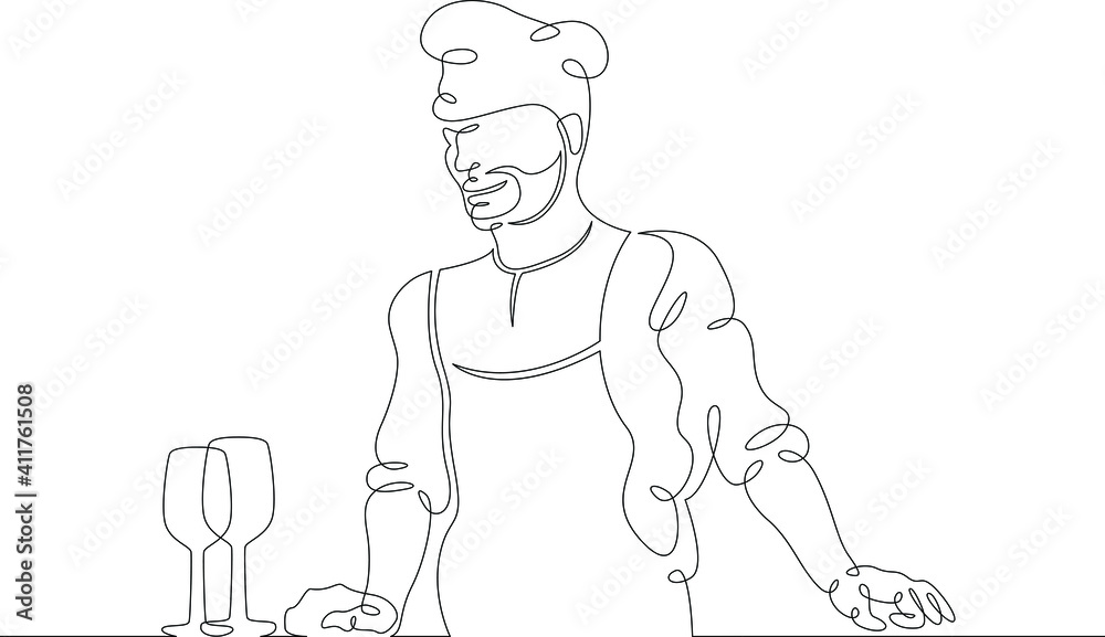 Chef prepares food in the kitchen. Male cook in uniform with kitchen ...