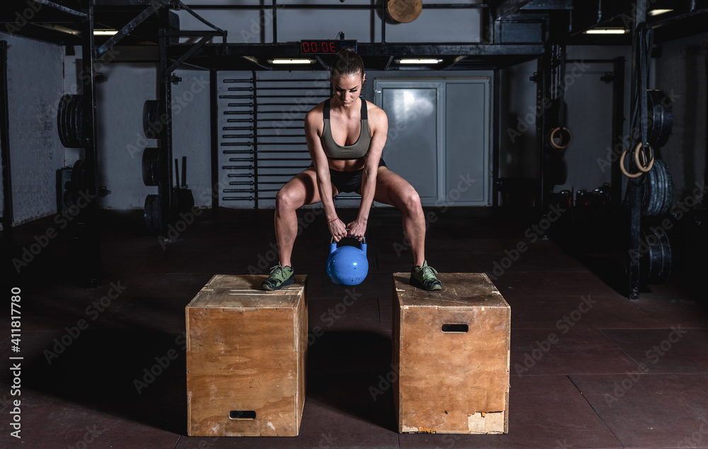 Young Sweaty Muscular Fit Girl With Big Muscles And Strong Legs Doing