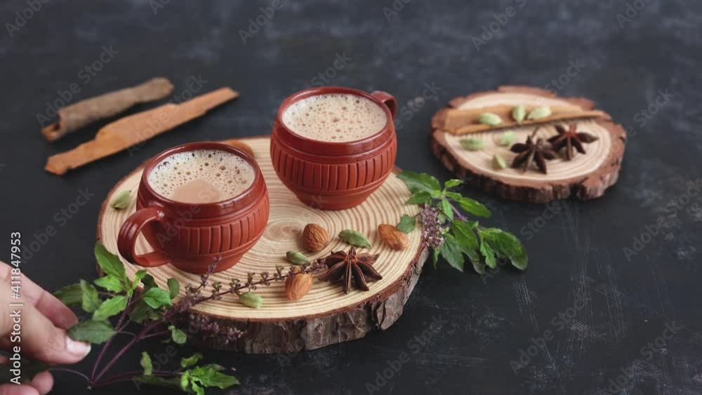 Vídeo do Stock: Indian Masala Chai traditional beverage tea with milk ...