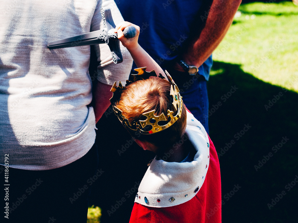 backside view of child hitting mother with knife Stock Photo | Adobe Stock
