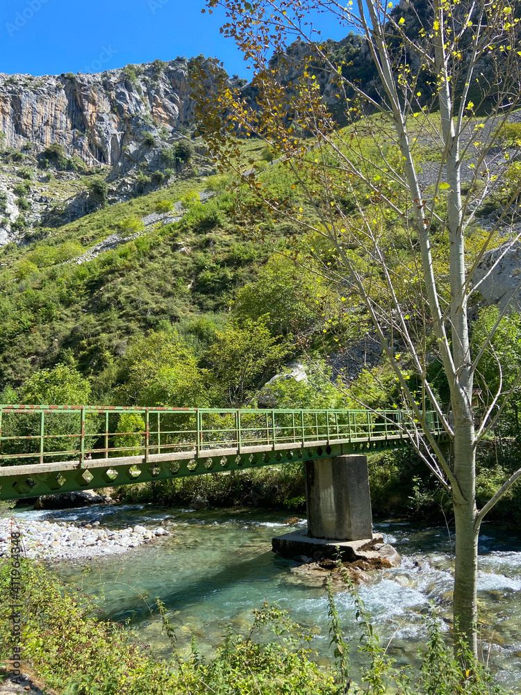 Bridge over the Cares river near Caín village (León), the route of the ...