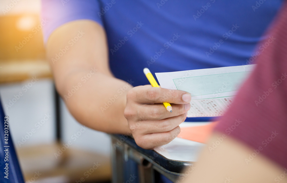high school,university student study.hands holding pencil writing paper ...