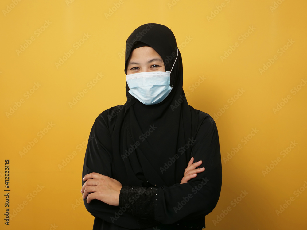 Muslim woman wearing hijab and mask during coronavirus covid pandemic ...