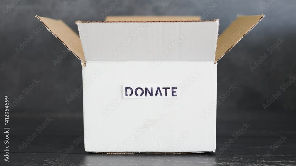 empty box with Donate label for second-hand items to be given away ...