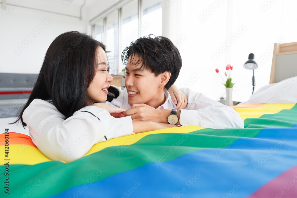 LGBTQ couple lovers, a handsome girl as a man or butch femme girl ...