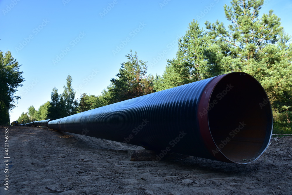 Natural gas pipeline construction work in forest area. Petrochemical ...