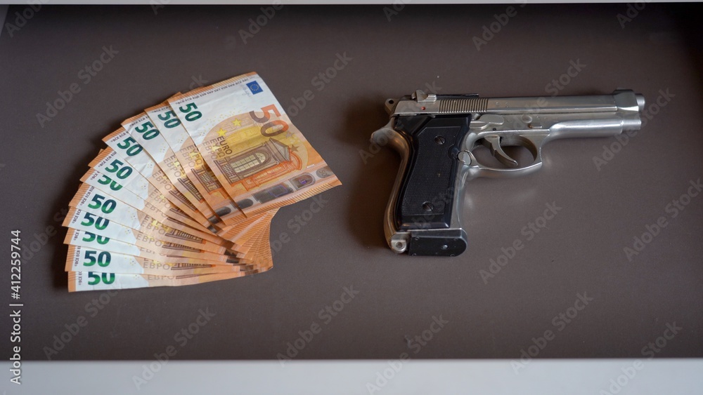 revolver gun army and money cash banknote 50 euro - mafia and criminal ...