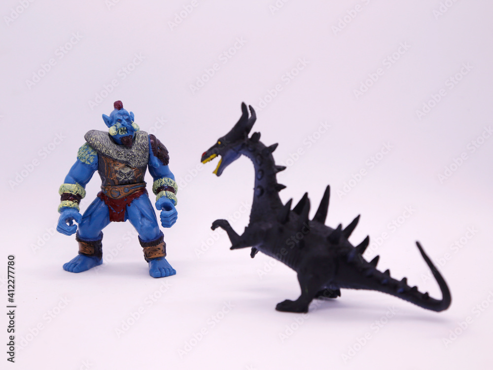 Troll faced with dragon. Mythological beings. Troll. Ogre. Monster ...