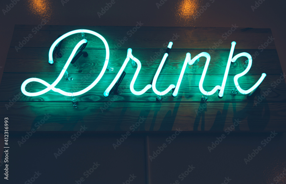 Illuminated sign that says Drink Stock Photo | Adobe Stock