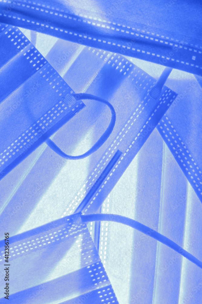 Surgical mask with rubber ear straps. Typical 3-ply surgical mask to ...