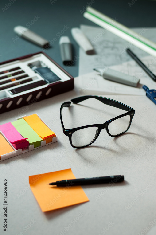 Glasses And Sticky Notes On The Office Desk Stock Photo | Adobe Stock