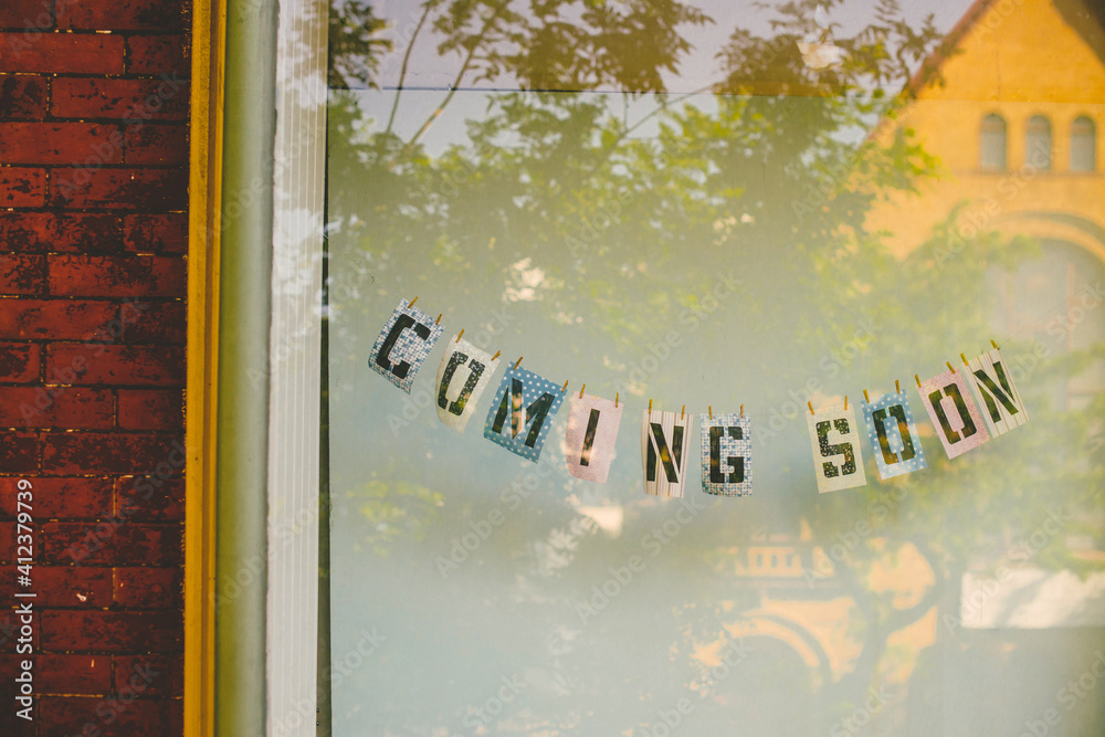 Coming Soon sign in window Stock Photo | Adobe Stock