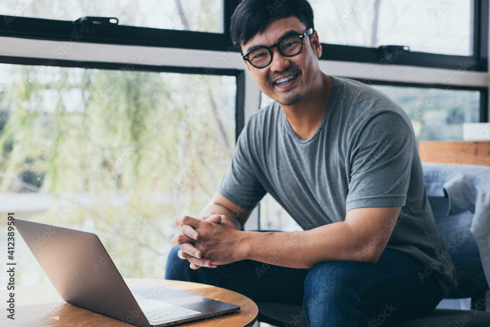 asian man work using computer hand typing laptop keyboard contact us ...