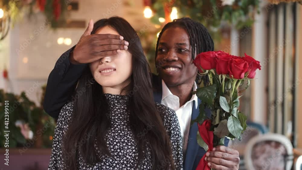 Love relationship, romantic date. The multiracial couple on date at ...