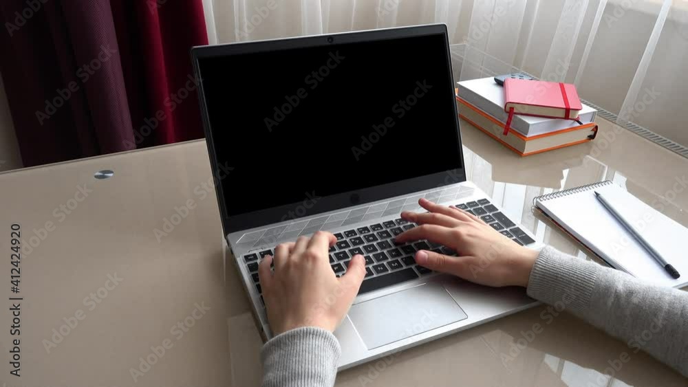 The girl working at home office hands on keyboard. Alpha channel ...