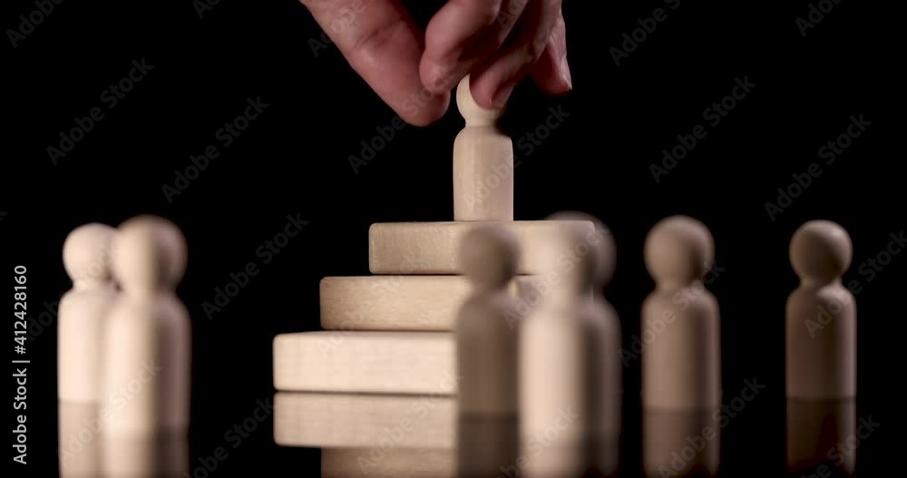 4K Video slow close up hand move employee icon to top of stair steps ...