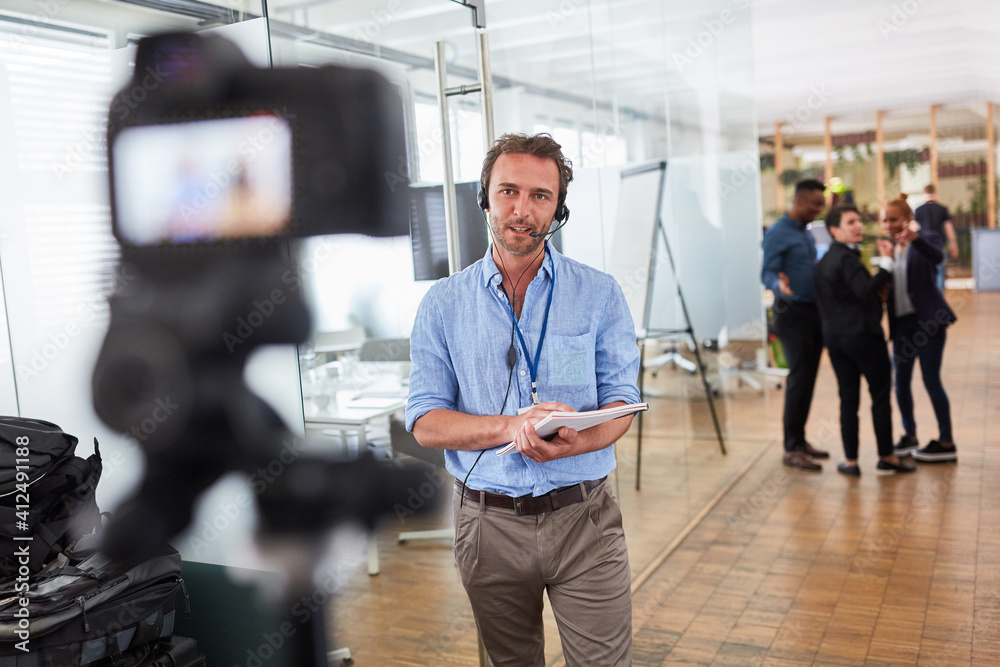 Reporter or coach in front of the video camera Stock Photo | Adobe Stock