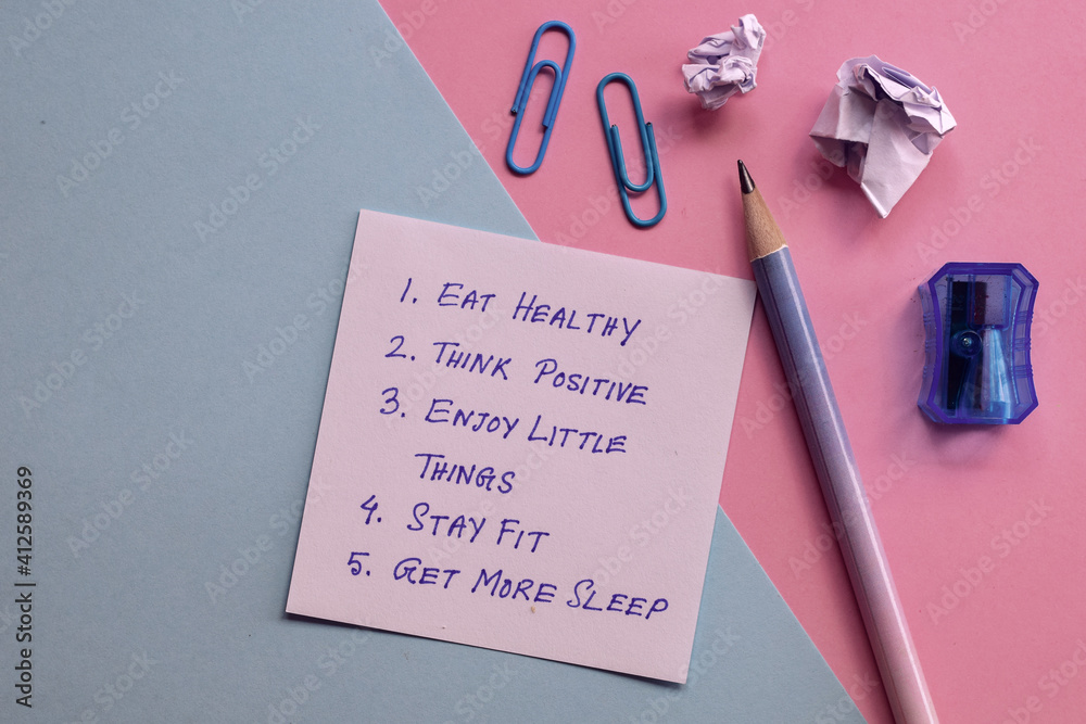 Wellness routine list for healthy lifestyle laid on pastel color page ...