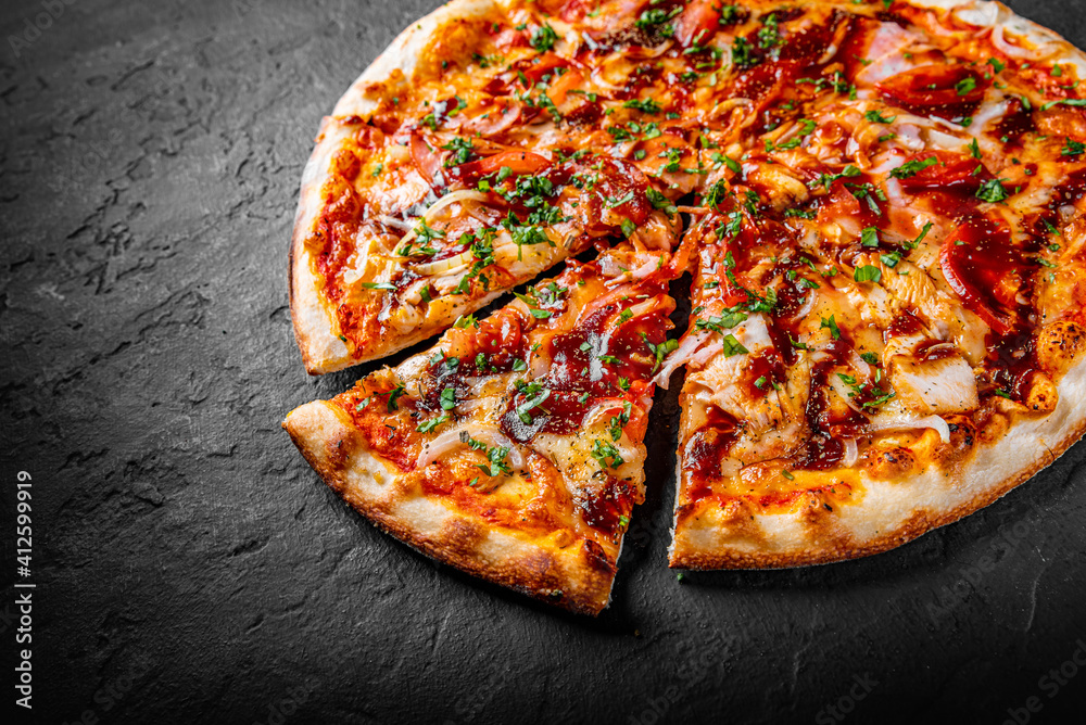 Pizza with chicken and barbeque sauce. Italian pizza on Dark grey black ...