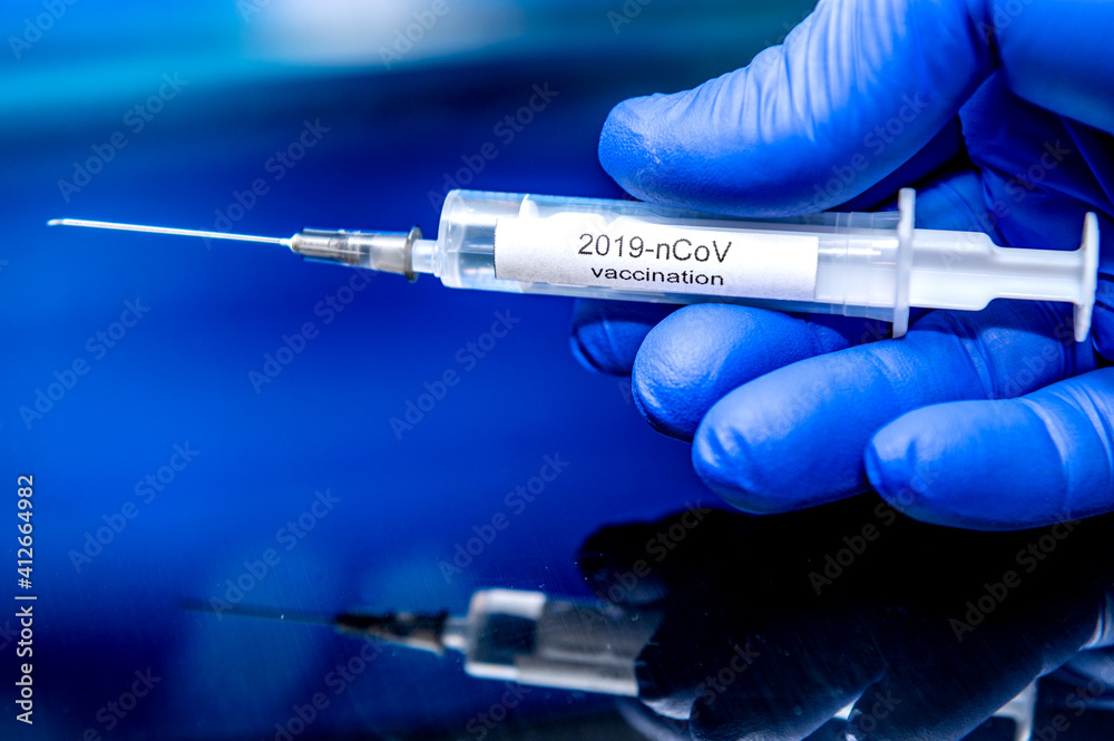 Covid-19 CORONAVIRUS VACCINE AND SYRINGE. Vaccination Stock Photo ...