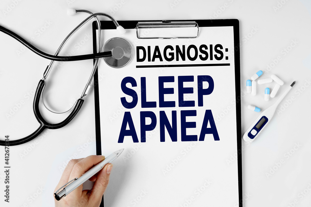 On the table are a stethoscope, a pill thermometer, and a diagnosis ...