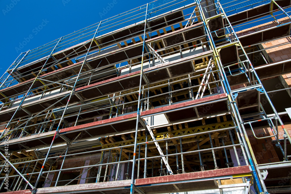 scaffolding, reconstruction, building site, new building of a house ...