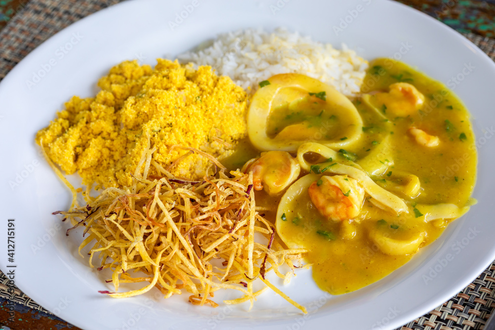 Squid and shrimp bobó (Bobó de camarão). Brazilian food Stock Photo ...
