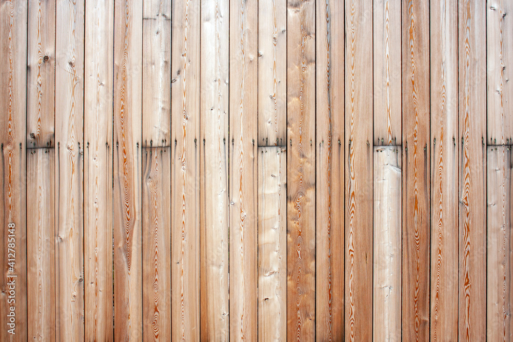 Facing the house with horizontal boards. Vertical boards on the wall of ...