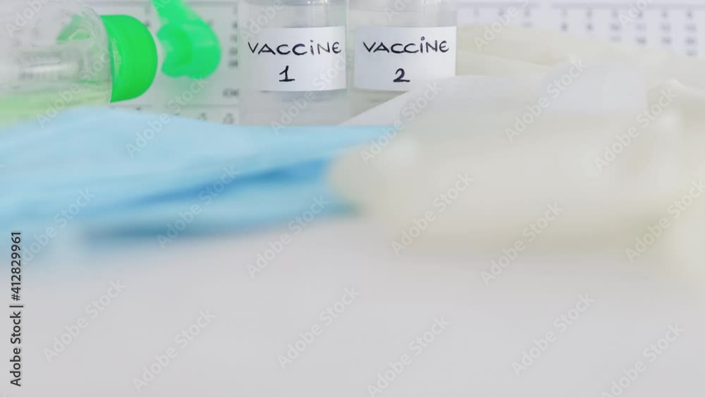 covid-19 vaccine against the pandemic, ampoules with Vaccine 1 and ...