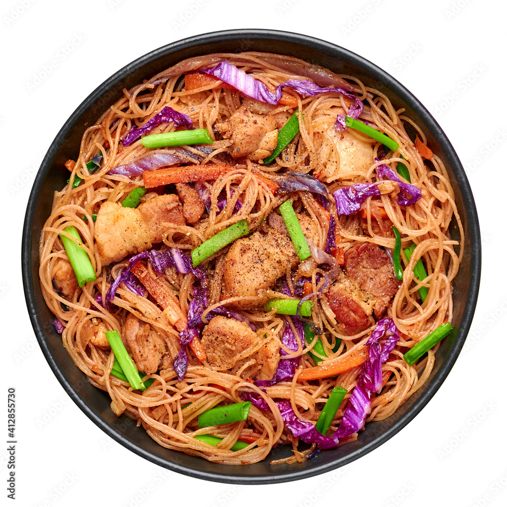 Pancit Bihon in black bowl isolated on white. Filipino cuisine noodles ...