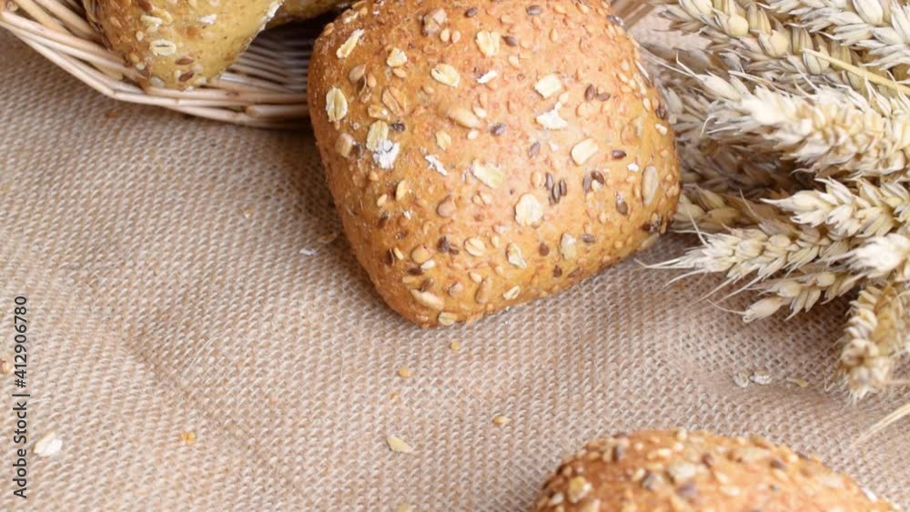 Cut bread. Fresh loaf of rustic traditional bread with wheat grain ear ...