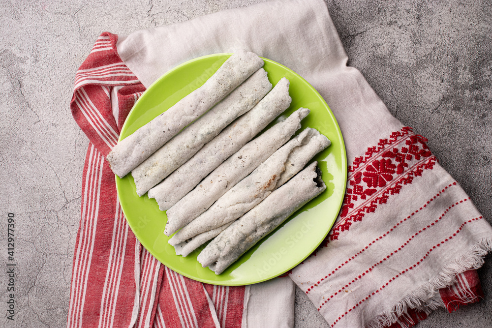 Til pitha a traditional food of Assam isolated stock image. Stock Photo ...