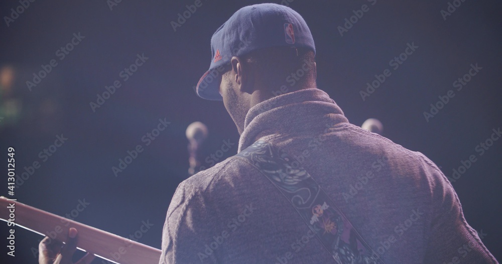 Black music man standing back giving performance. Male afro silhouette ...
