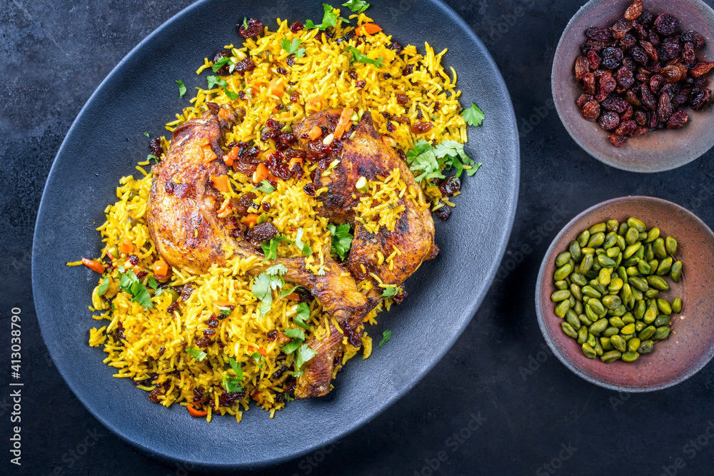 Modern style traditional fried Arabic chicken majboos with chicken leg ...