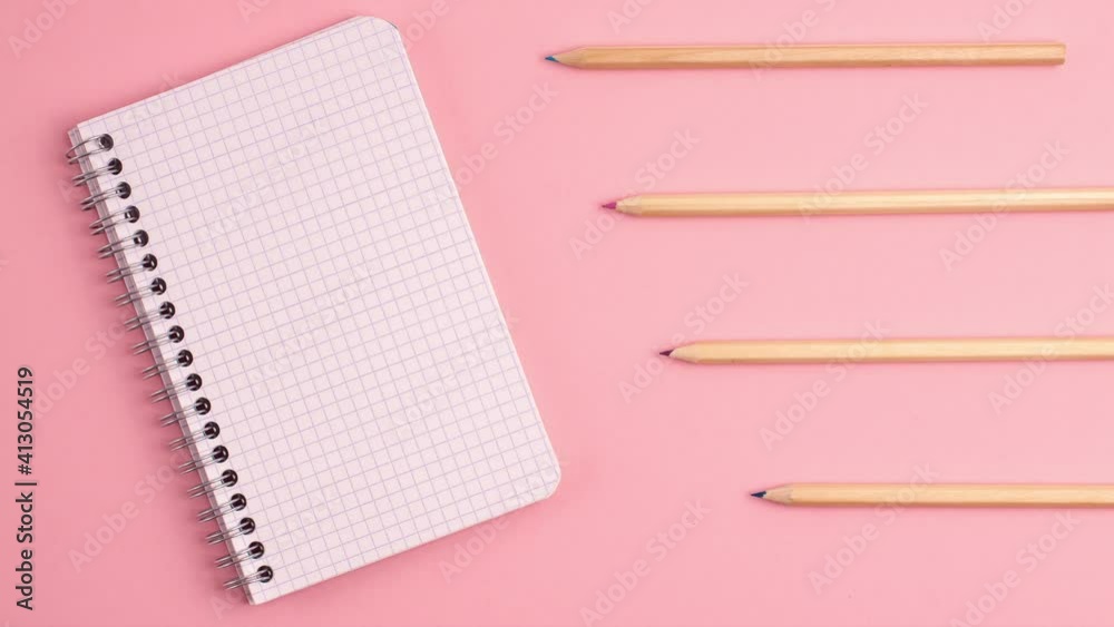 Stop motion animation mockup of white notepad and wooden pencils on ...