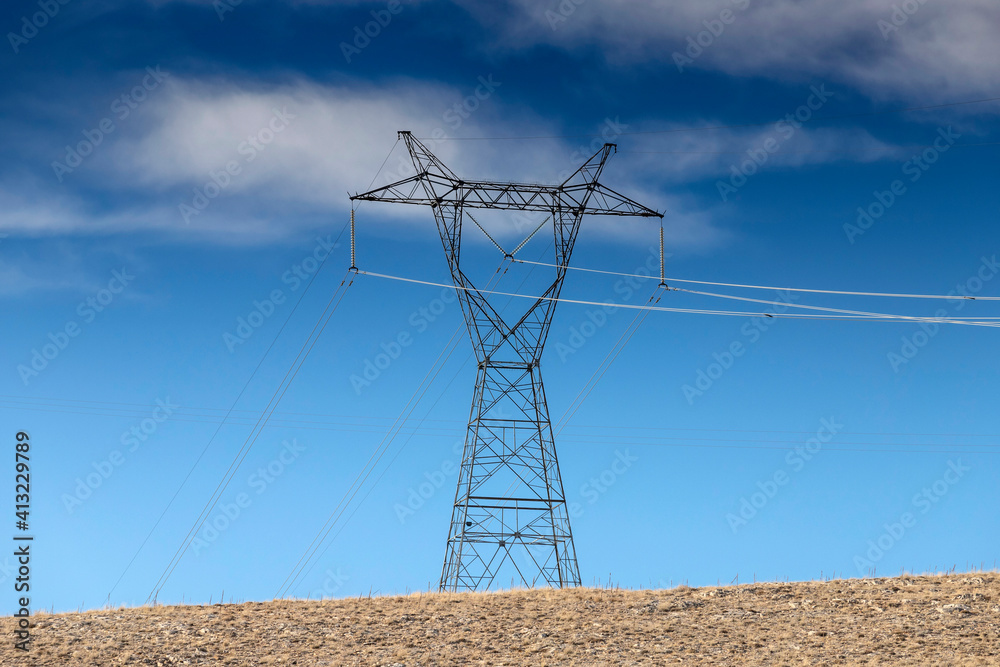 High voltage electric pole and transmission lines. High voltage grid ...