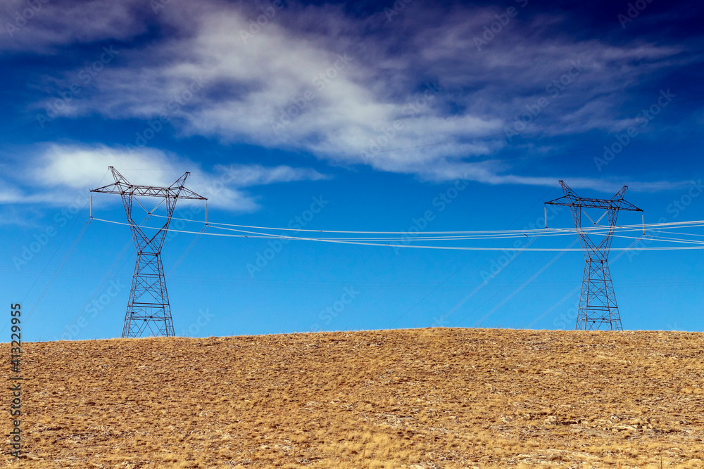 High voltage electric pole and transmission lines. High voltage grid ...