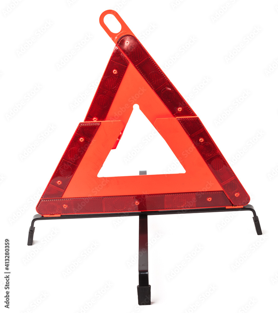 Warning stop sign made of red reflective plastic with a blue case on a ...