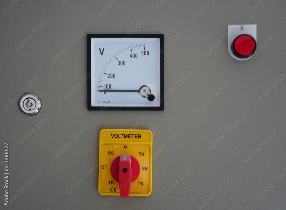 Analog voltmeter with dial and arrow. Indoor electrical voltage control ...