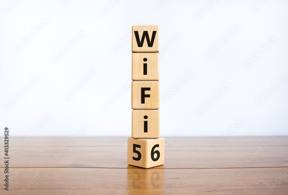 WiFi 5 or 6 symbol. Turned a wooden cube and changed the words WiFi 5 ...