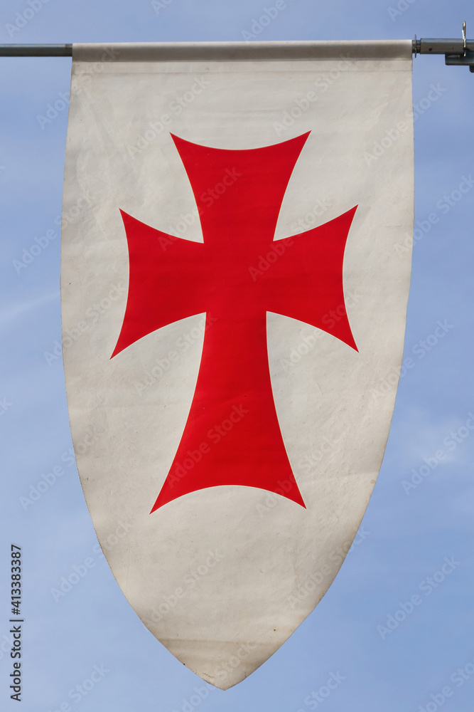 Red cross flag hanging. Medieval symbol of the Templar order Stock ...