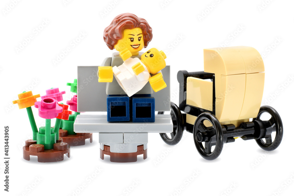 Lego minifigure mother and little baby in carriage. Editorial ...