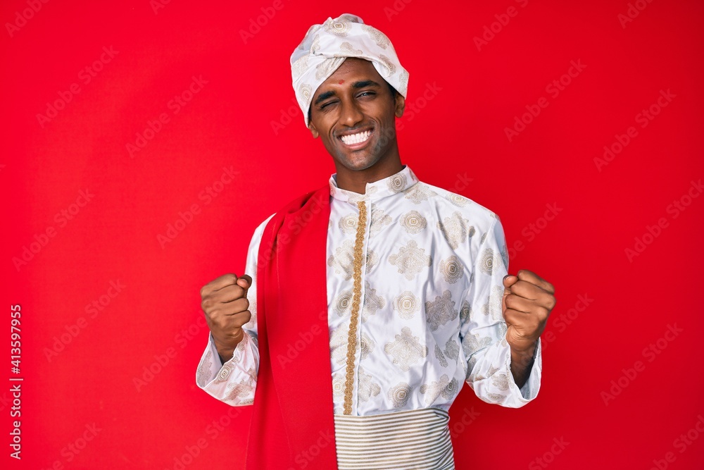Handsome indian man wearing tradition sherwani saree clothes excited ...