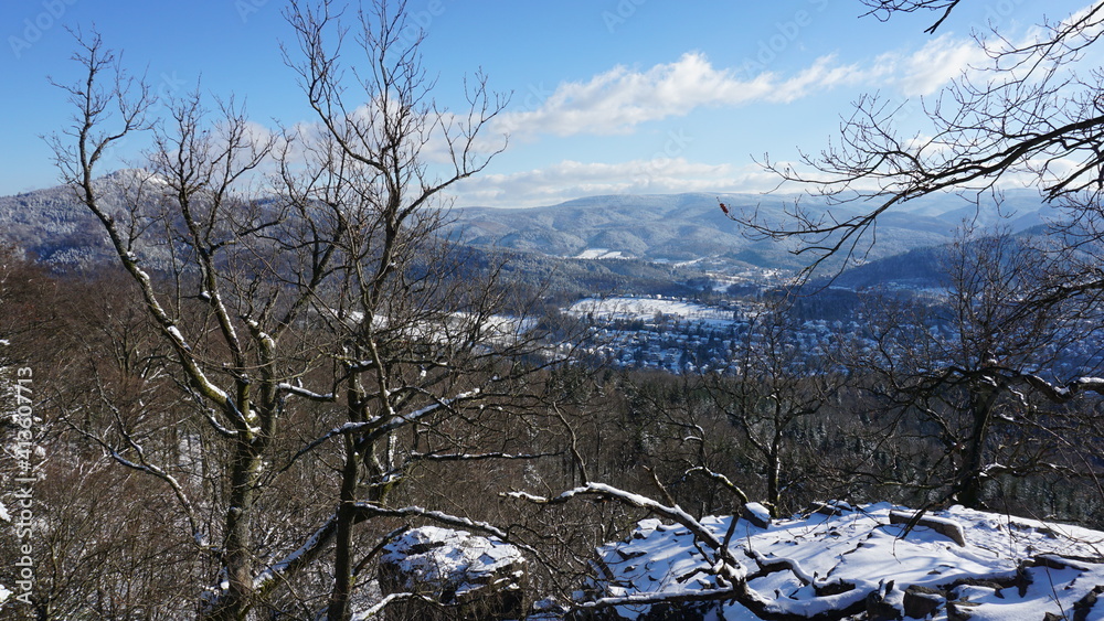 the view from the snowy Ritterplatte (knight plate) at the Battert, a ...