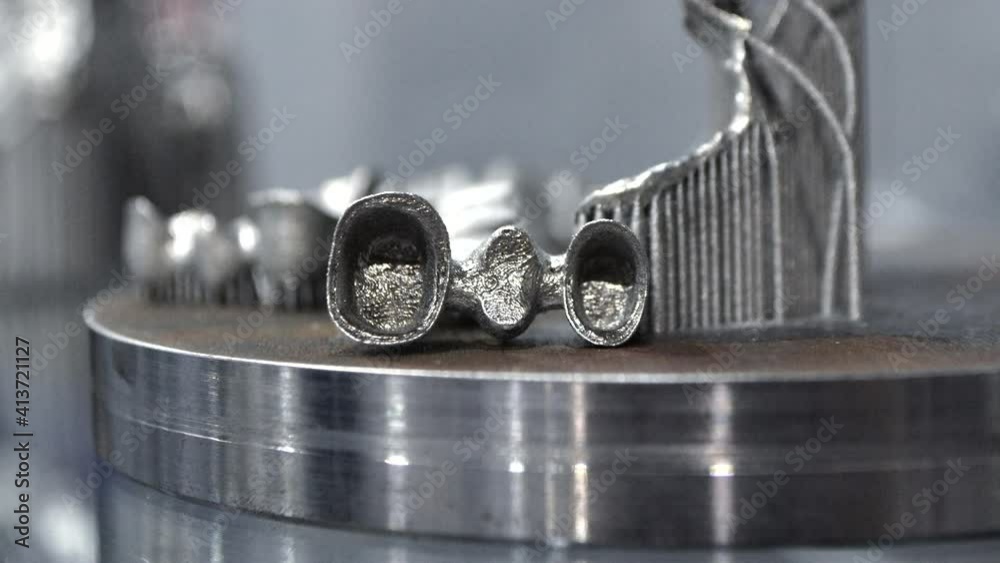3D model of human teeth printed on metal 3d printer close-up ...